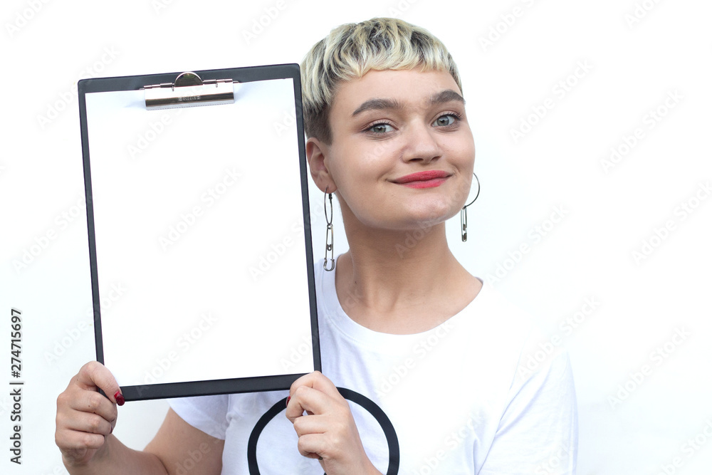 Young blonde girl showing blank white big A4 paper. Leaflet ...