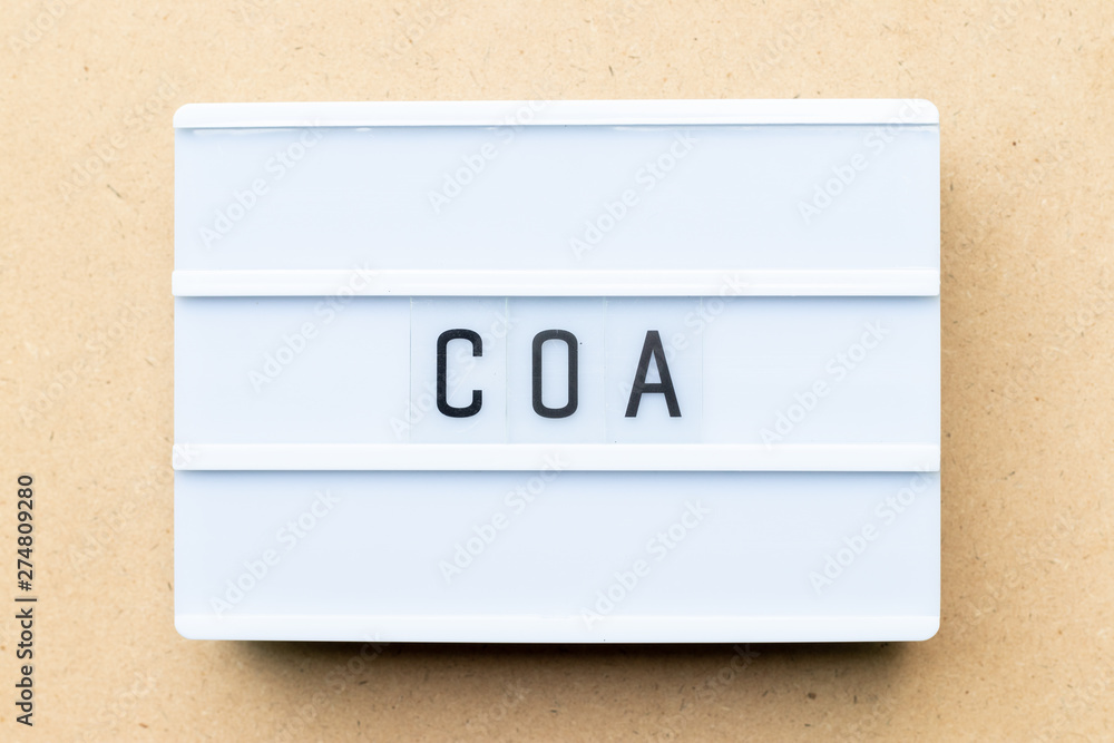 White lightbox with word COA (abbreviation of certificate of analysis ...