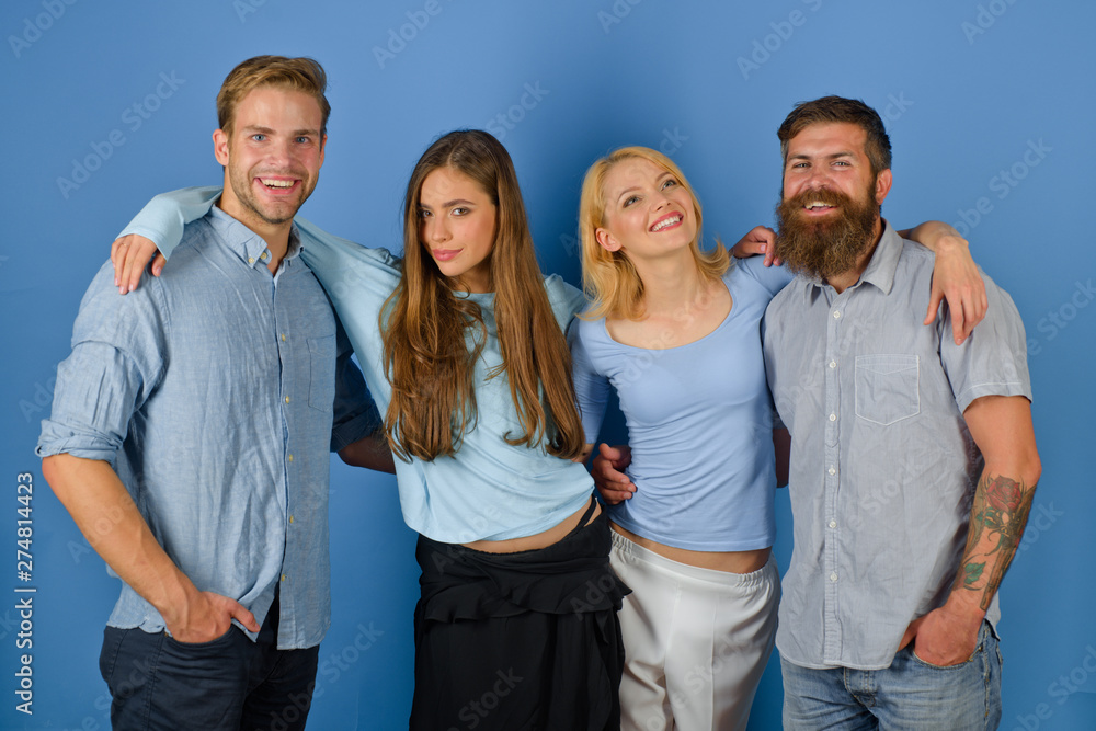 Friendly relations. Girls and guys happy together. Women hugs men. More ...