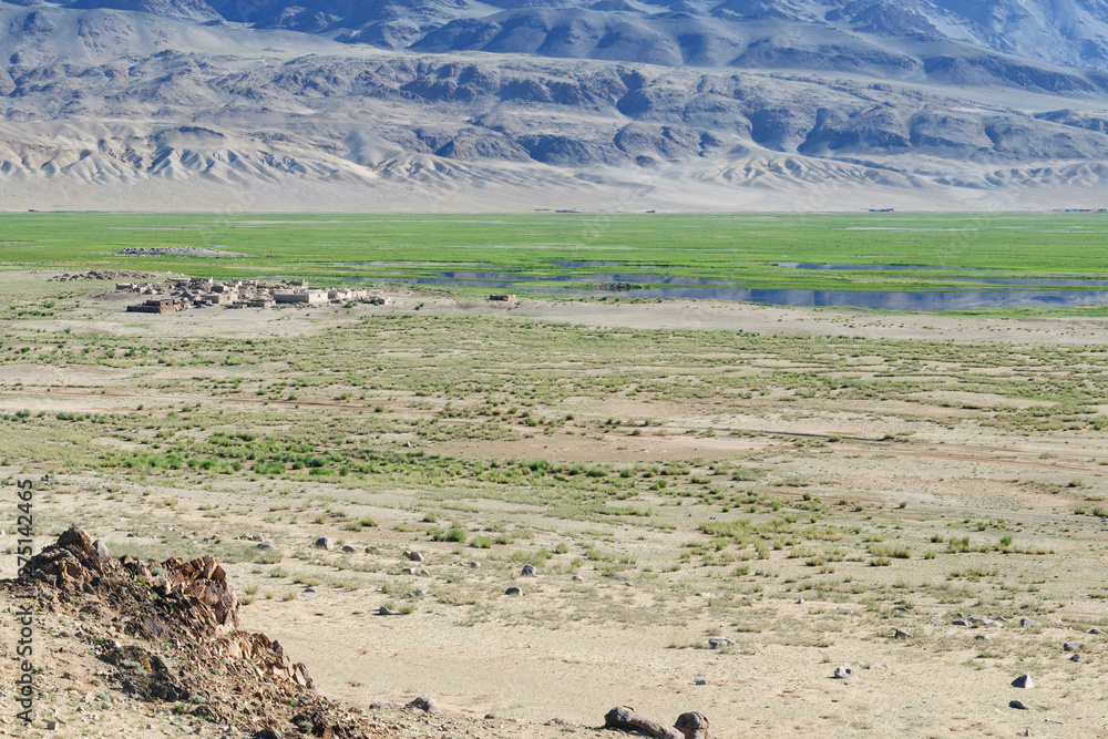 Western Mongolia steppe landscape. Old Kazakh cemetery in Khovd River ...