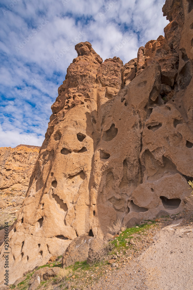 Holes in a Volcanic Tuff Cliff Stock Photo | Adobe Stock