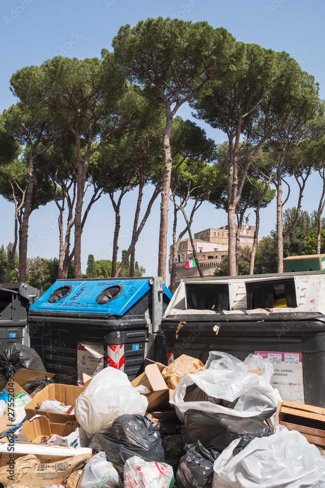 absolutly overloaded garabge containers with waste on the street in ...