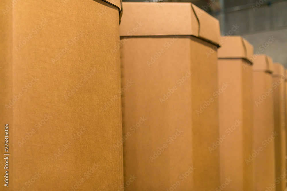 Stack of big industrial cardboard boxes. Craft Cargo Boxes stacked side ...