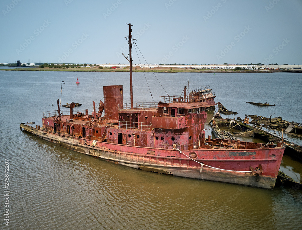 Aerial drone image of Sunken and rotting Wood ships and rotting hulls ...