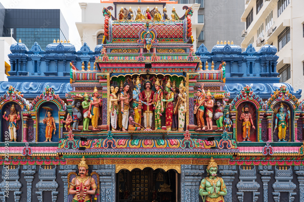 Colourful statues of Hindu religious deities adorning the entrance of a ...