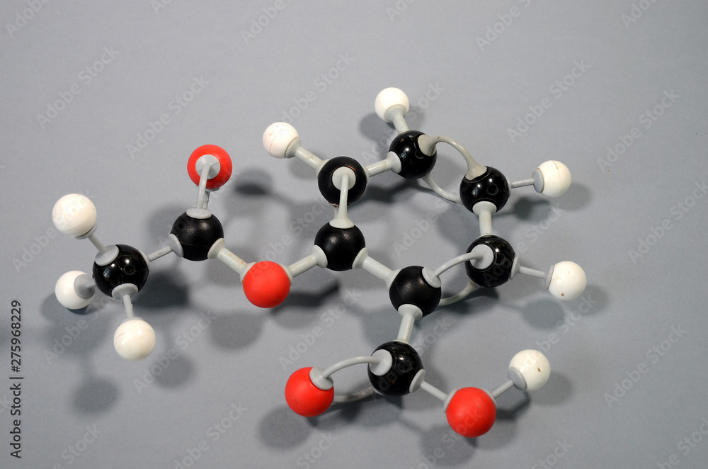 Molecule model of acetylsalicylic acid HC9H7O4 (ASA). Red is oxygen ...