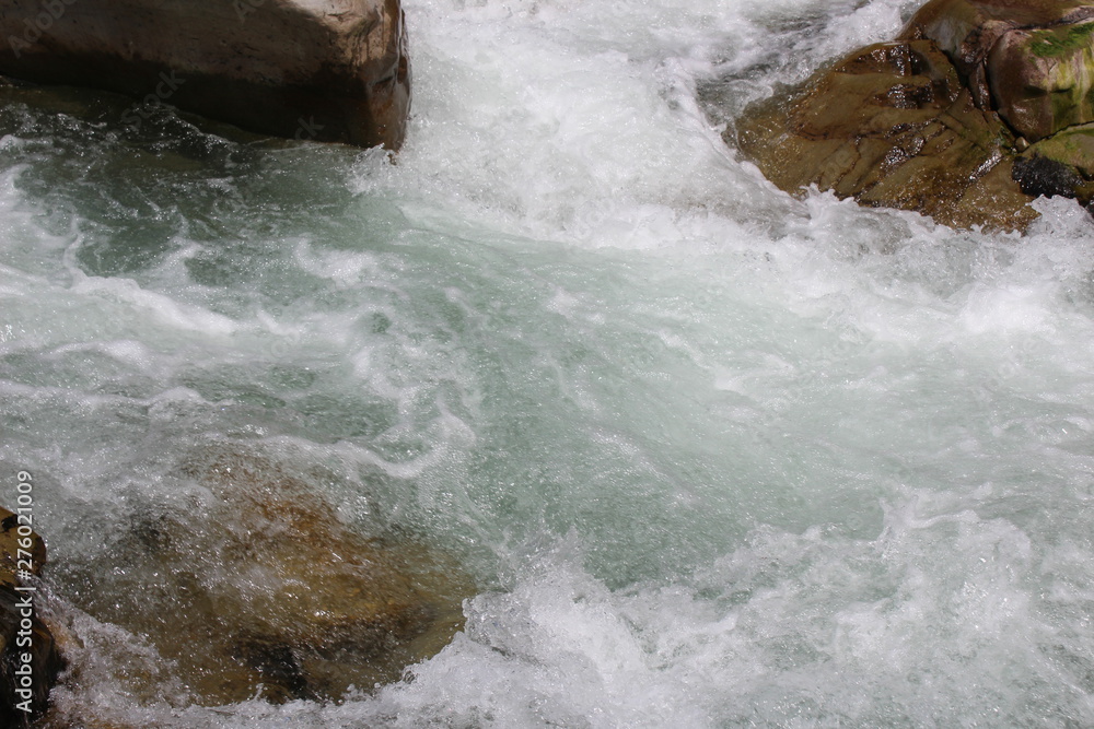 Melting snow makes powerful water flow in Canyon Creek in the North ...