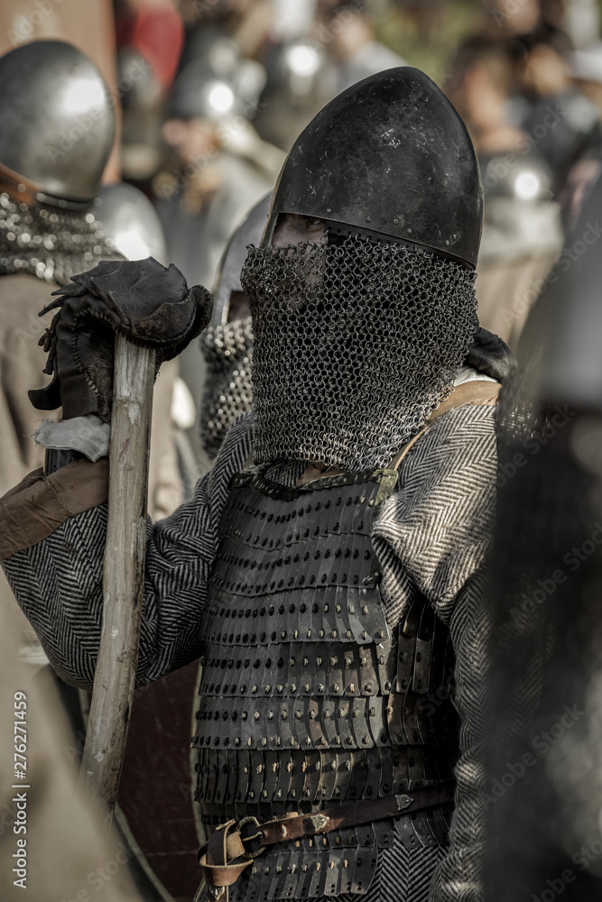 Medieval warrior in armor and helmet Stock Photo | Adobe Stock