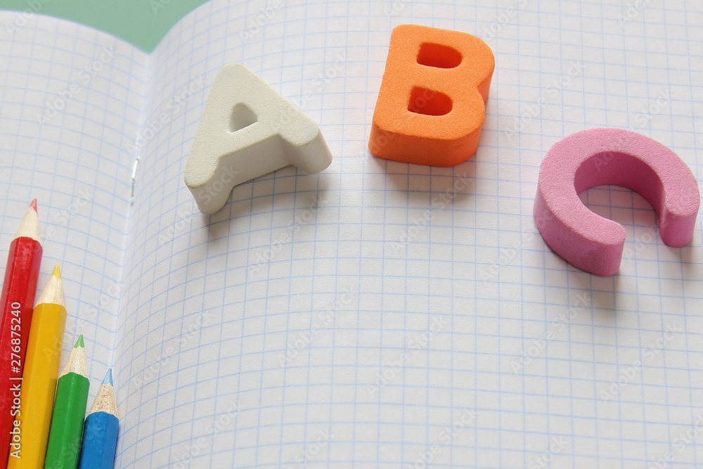 ABC-the first letters of the English alphabet and colored pencils on ...