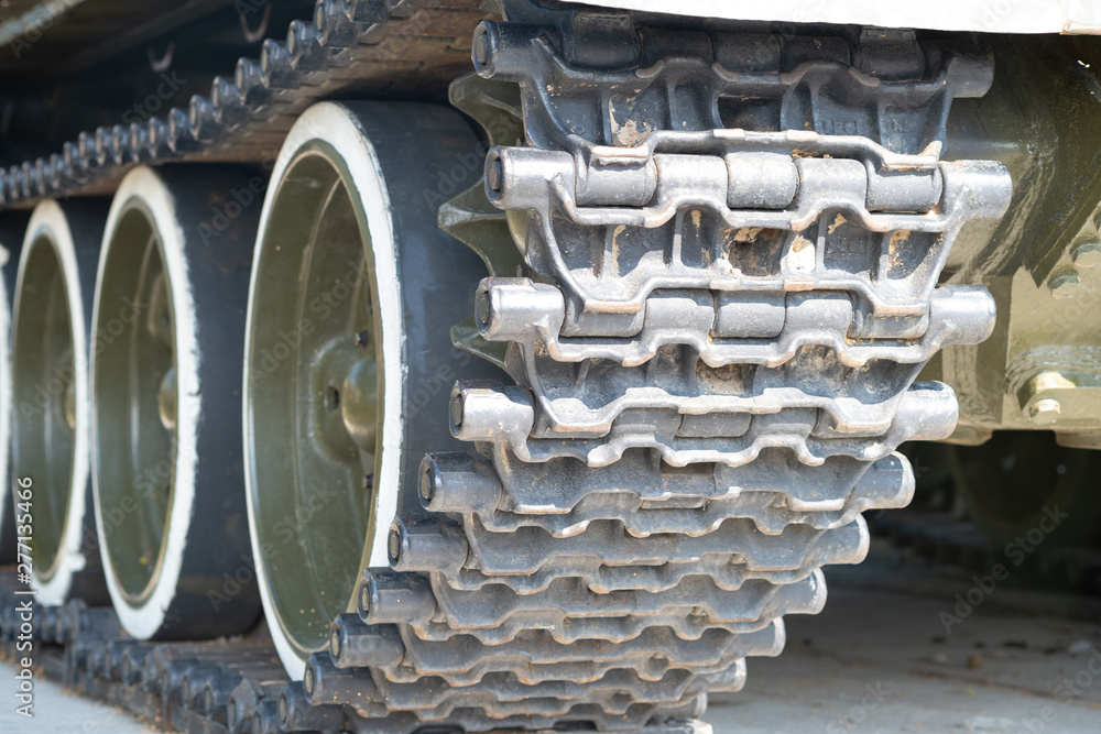 A tank of the second world war. Caterpillar armored closeup shot. Black ...