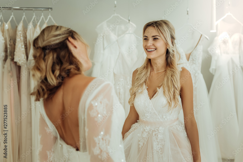 Two women at their wedding shopping together. Stock Photo | Adobe Stock