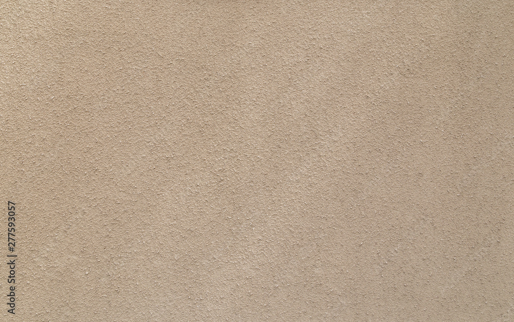 Plastered, painted, rough and beige or light brown concrete or stone ...