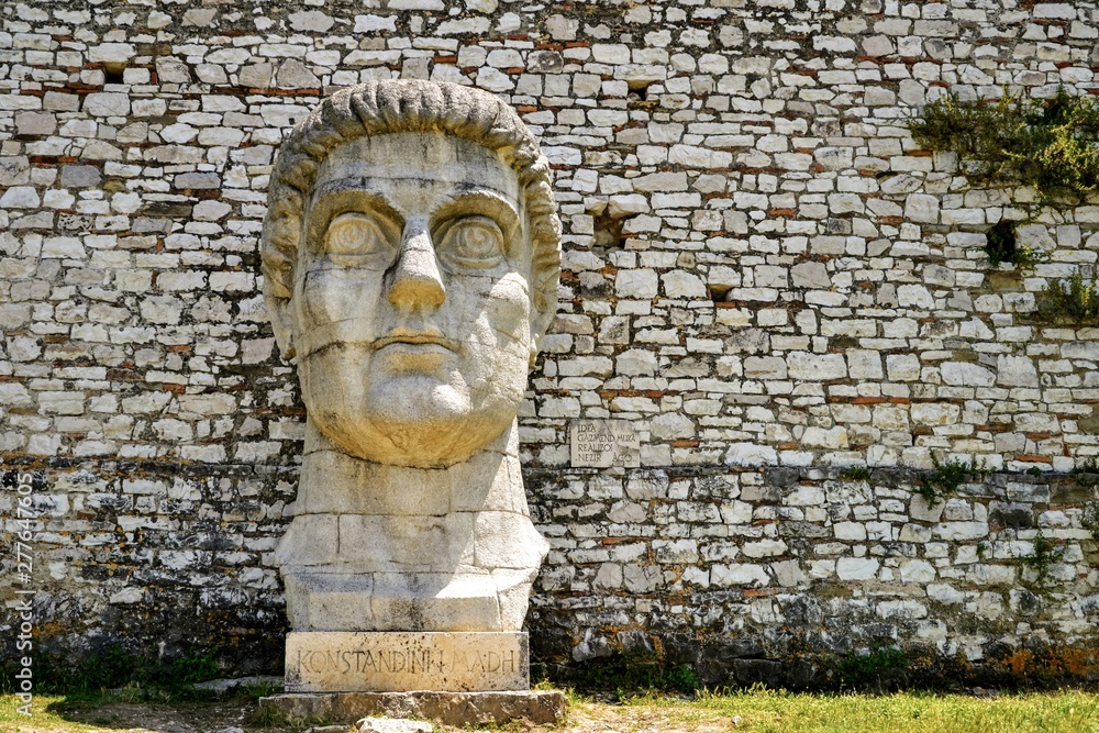 Giant stone head of Constantine the Great at Berat Castle in Berat ...