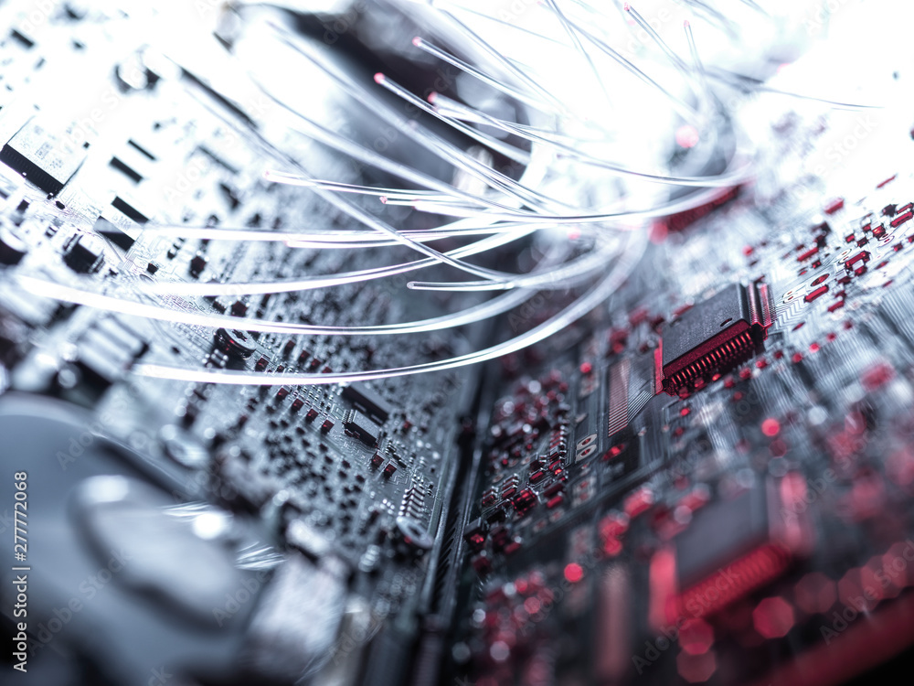 Fiber optics carrying data to computer hardware Stock Photo | Adobe Stock