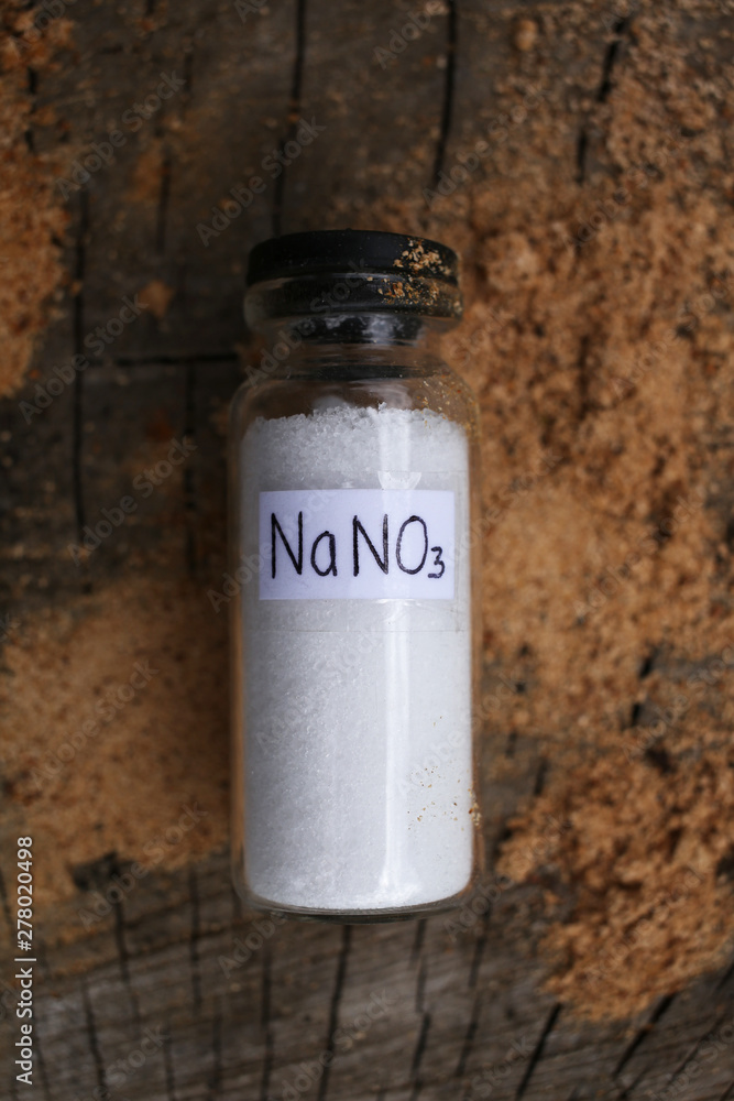 Full glass jar of sodium nitrate crystals, effective nitrogen ...