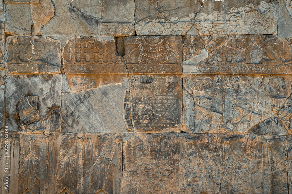 Ancien inscriptions on the walls of Persepolis, the ancient capital of ...