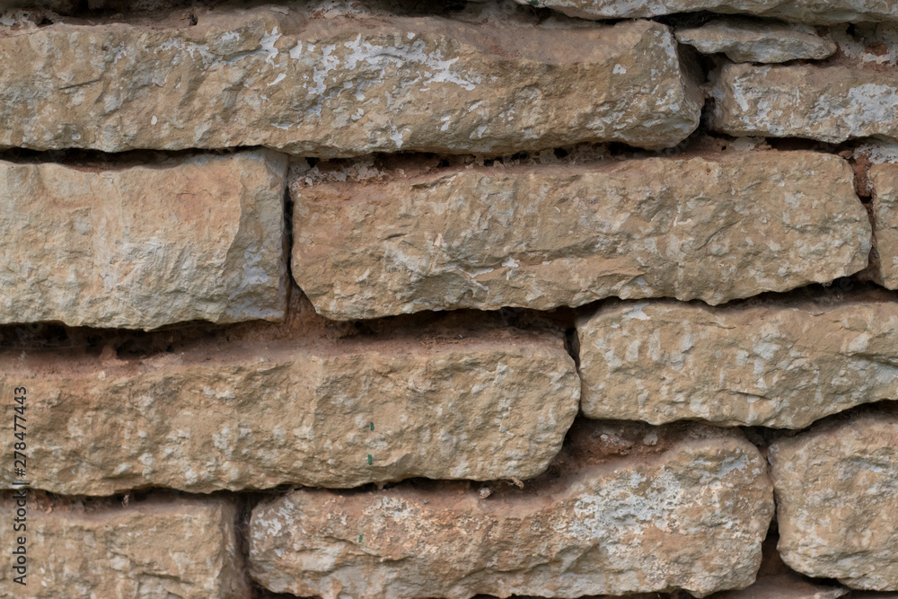 the wall of the castle built without binder of stone bricks Stock Photo ...