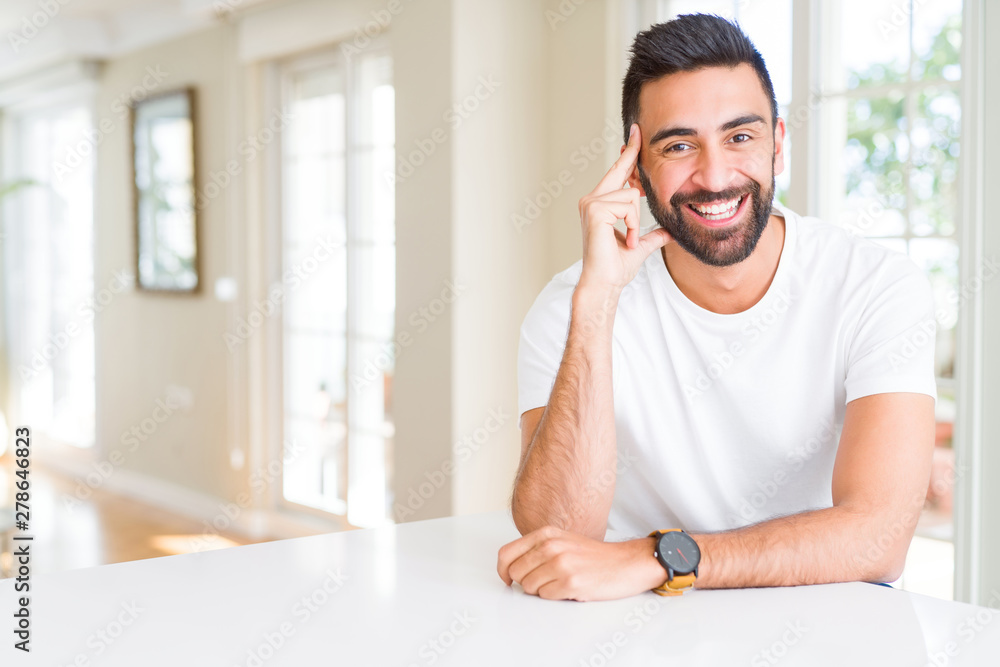 Handsome man smiling cheerful with a big smile on face showing teeth ...