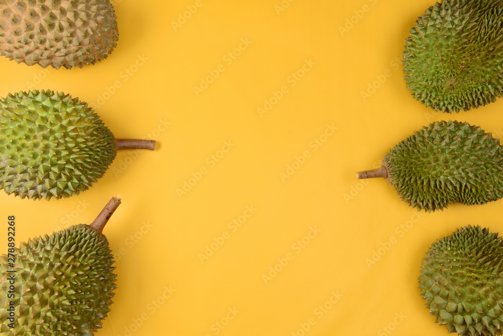 durian on bright yellow background with copyspace Stock Photo | Adobe Stock