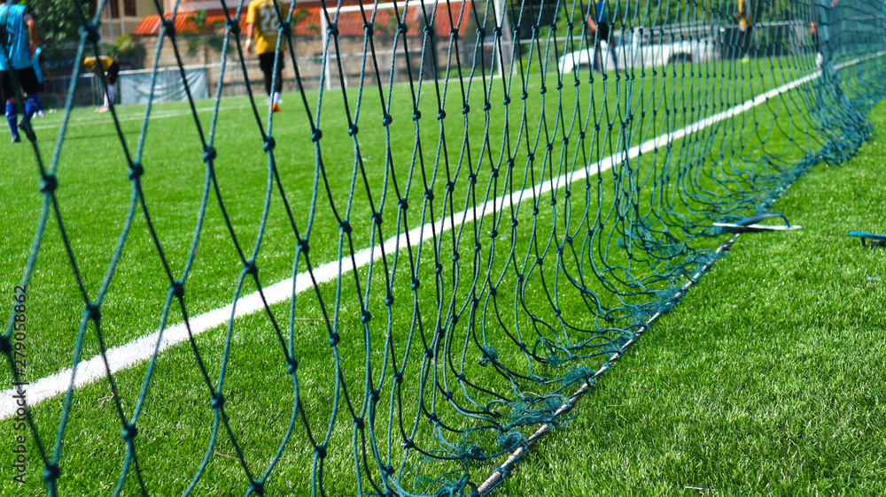 Mesh the football field to prevent the ball from disappearing. Stock ...