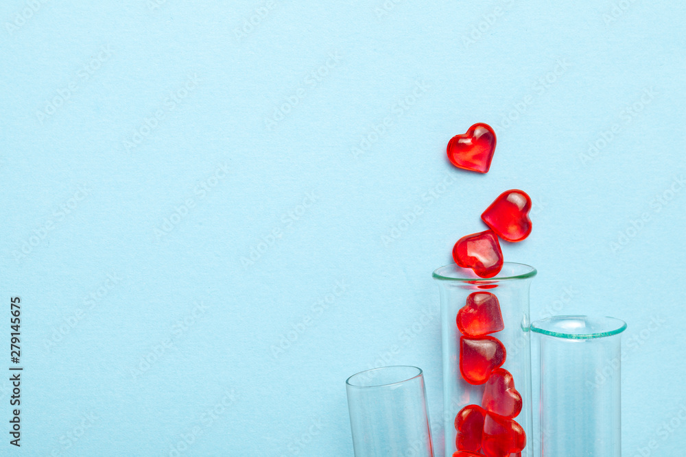 Hearts and test tube. Baby from tube vitro glass. Artificial ...