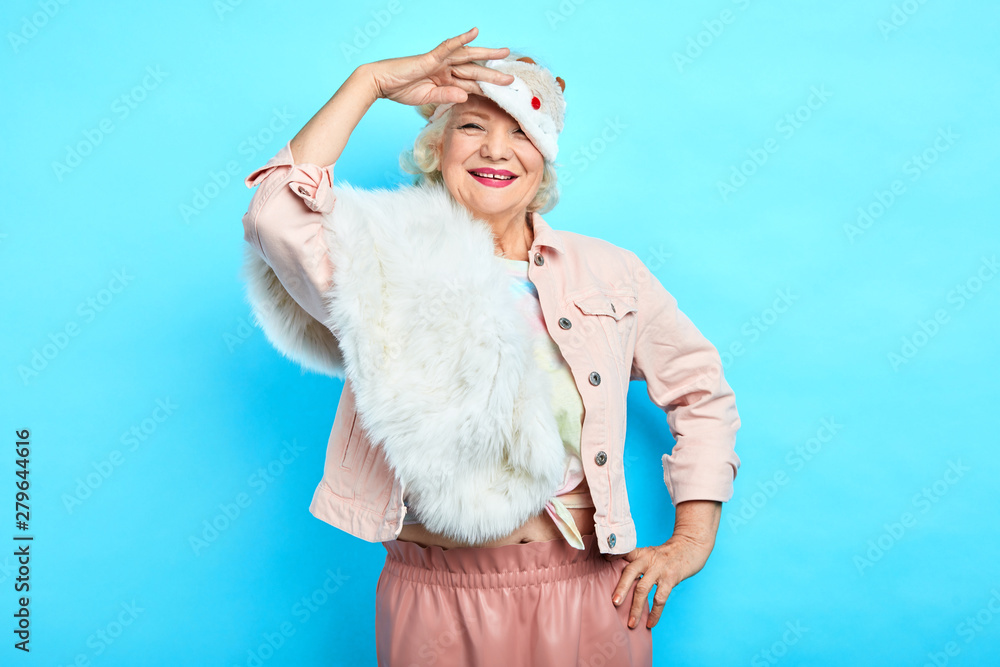 smiling positive fashion woman taking off, putting on mask,isolated ...