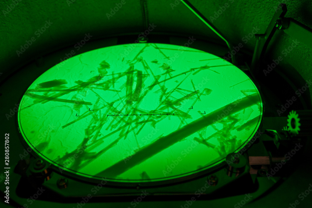 Environmental laboratory, crocidolite fibers (asbestos variety) seen on ...