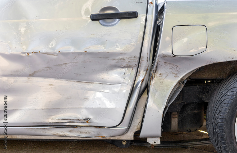 Car crash. Beside the light grey color pick up car have scratch from ...
