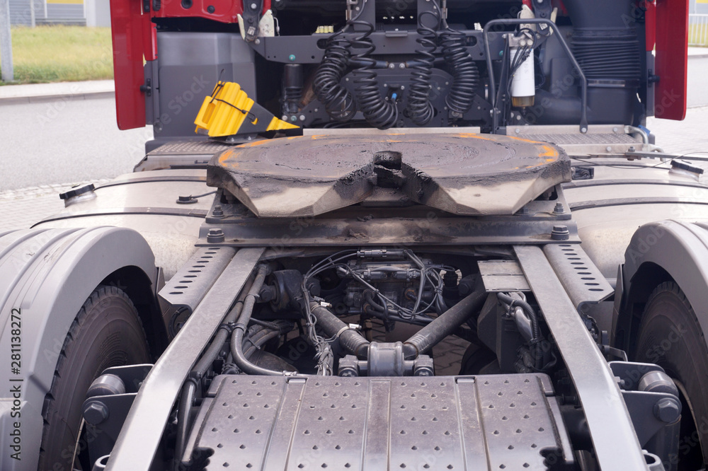 Rear of the tractor unit. Visible fifth wheel couplings are fitted to a ...