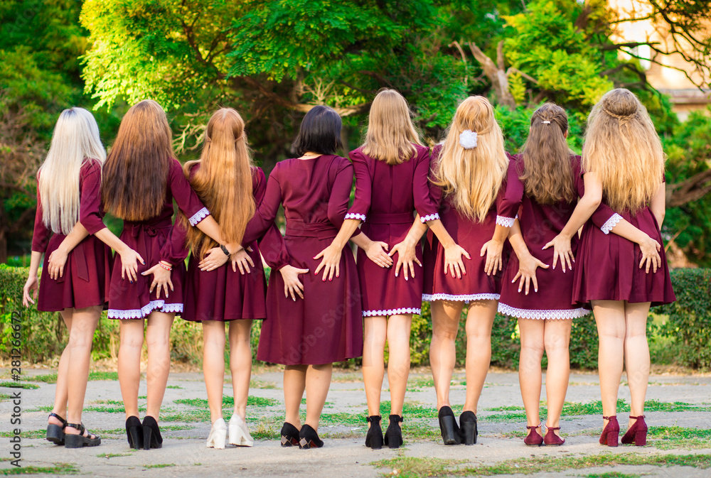 Funny beautiful friends girls grab other girls butt. Stock Photo ...