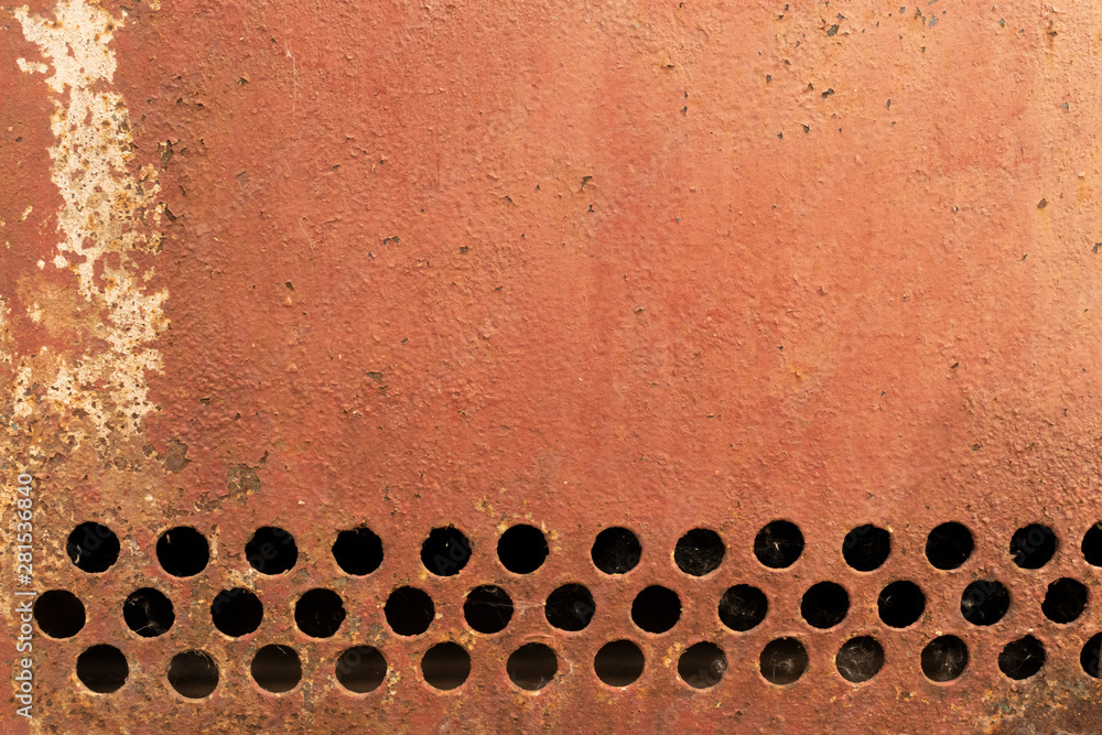 Iron sheet with three rows of holes at the bottom Stock Photo | Adobe Stock