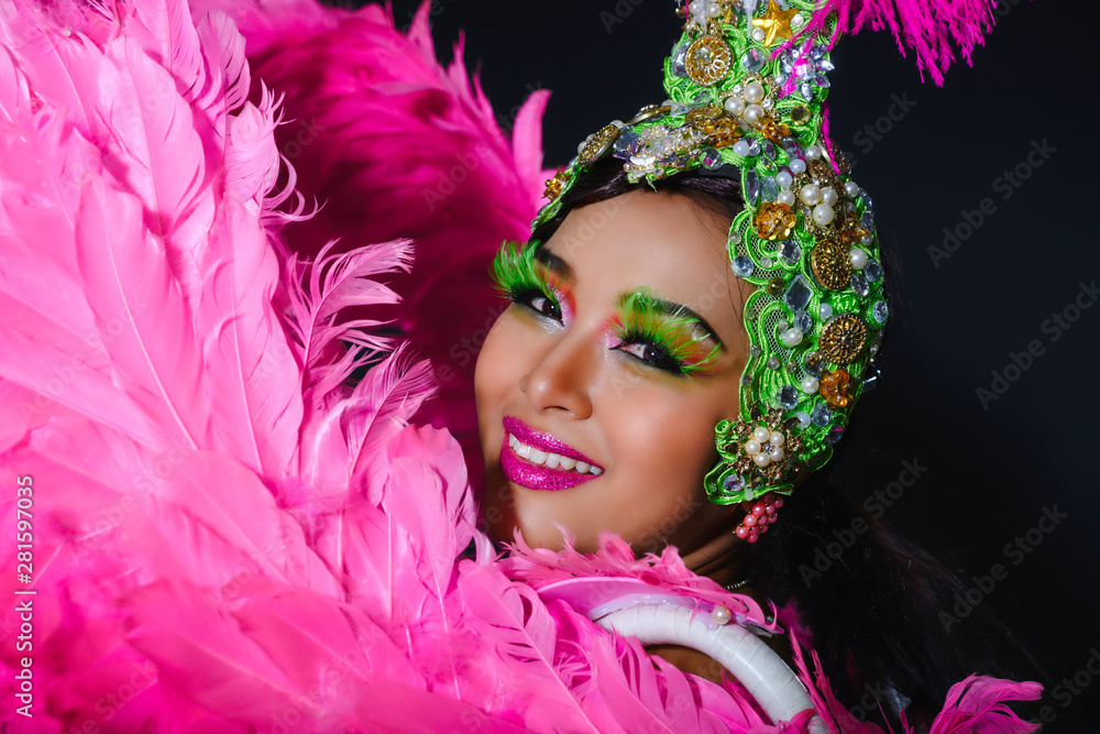 Beautiful Cabaret Show girl Dancer dress in pink feather with smiling ...