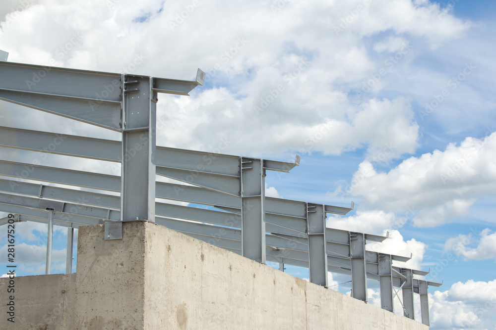 Metal construction on a concrete base. Construction of prefabricated ...