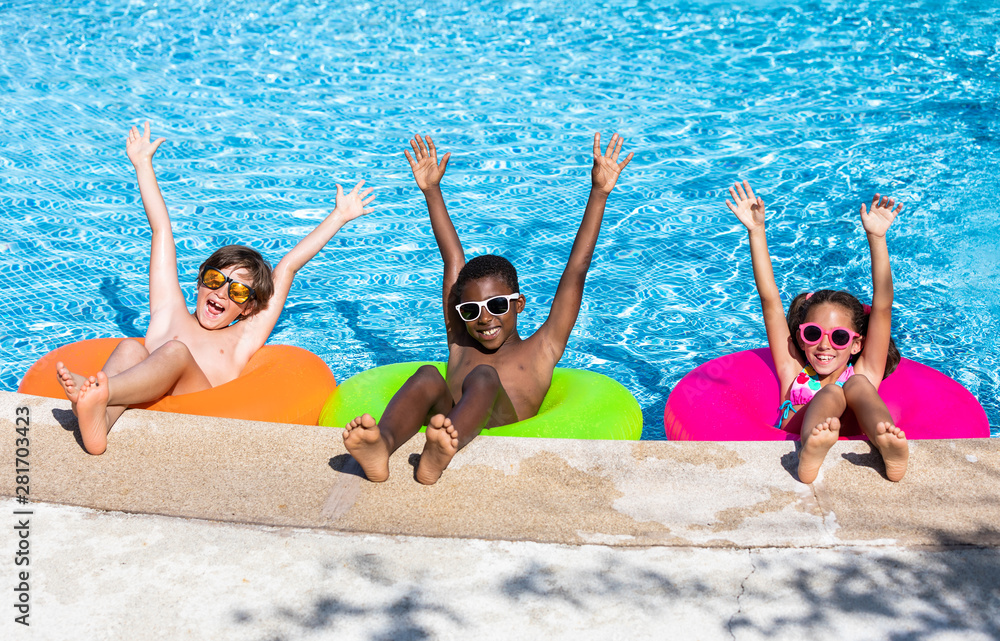 kids smiling and happy at the pool Stock Photo | Adobe Stock