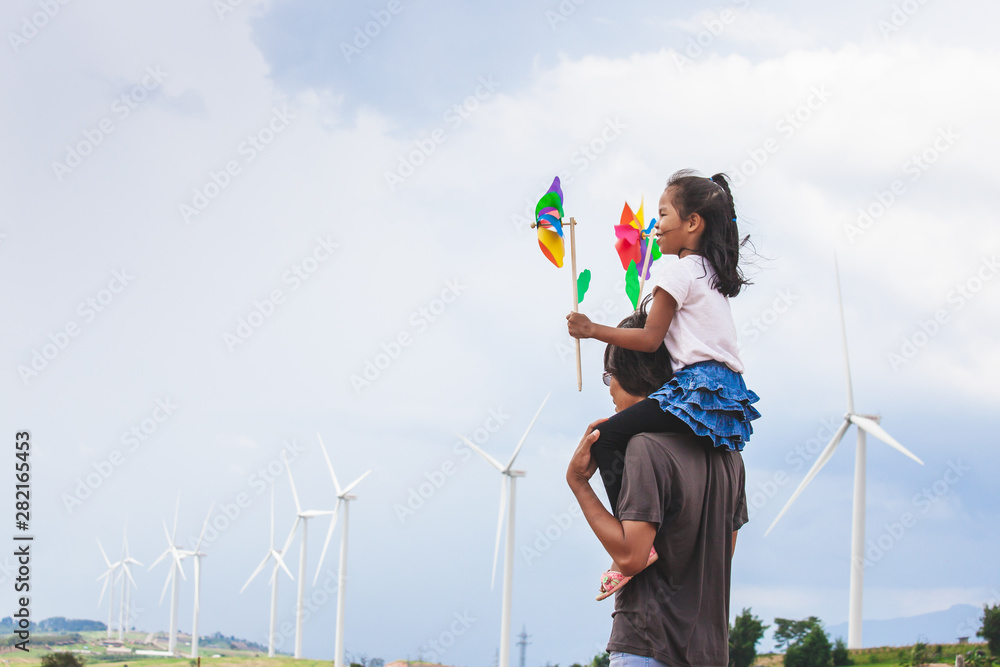 Father and daughter having fun to play together. Asian child girl ...