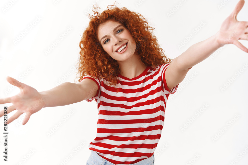 Come my arms. Friendly gorgeous ginger curly-haired caucasian girl ...