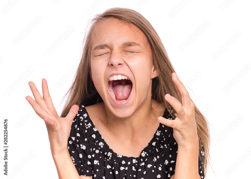 Angry Screaming teen girl, isolated on white background. Human emotions ...