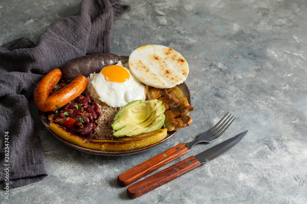 Colombian food. Bandeja paisa, typical dish at the Antioquia region of ...