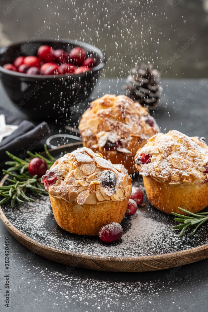 Muffins, cakes with cranberry, rosemary and almond nuts. Christmas ...