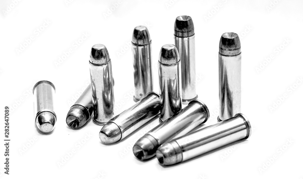 Ten bullets, five .38 special full metal jacket and five .357 magnum ones on a white background ...