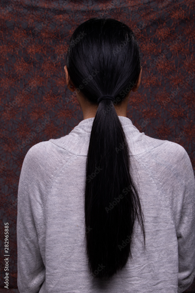 Back side view of Asian Woman before make up hairstyle haircut Hairdo ...