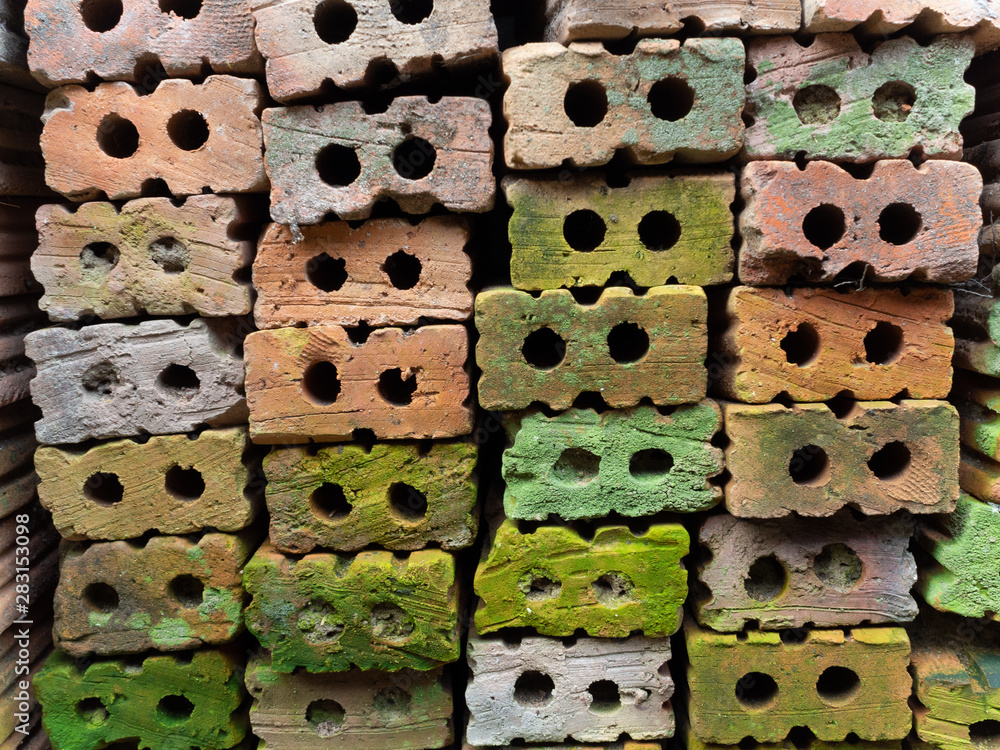 Many bricks stacked in multiple layers. Stock Photo | Adobe Stock