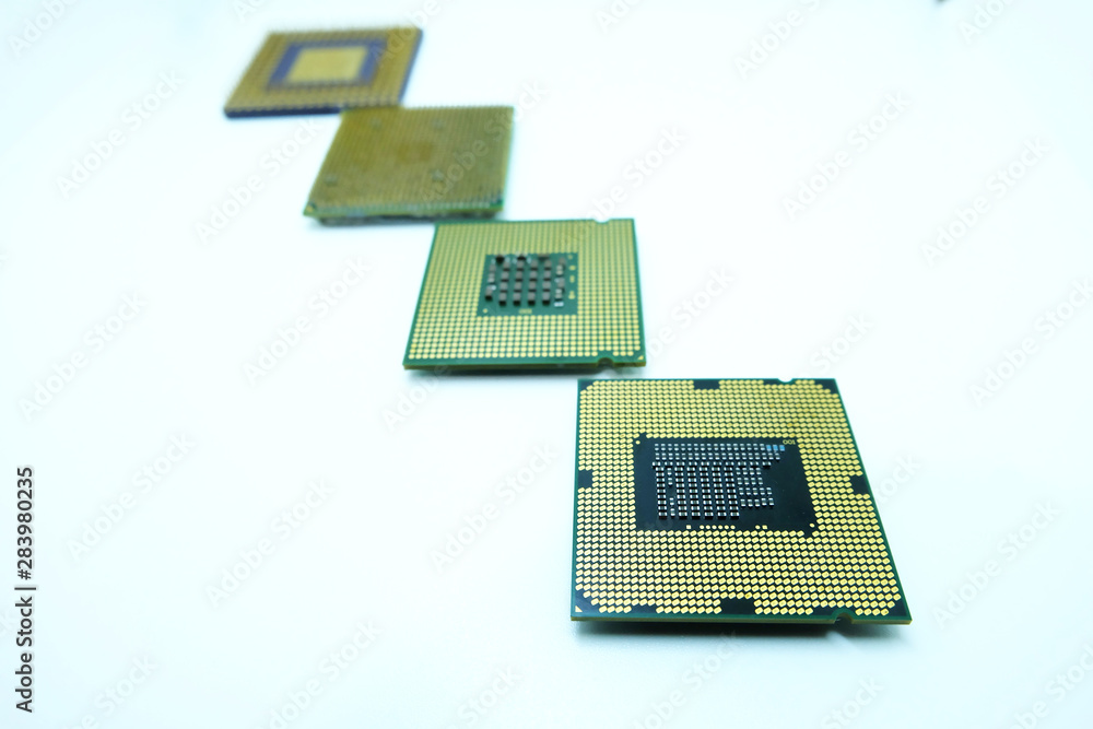 Many old computer processor microchips isolated on white background ...