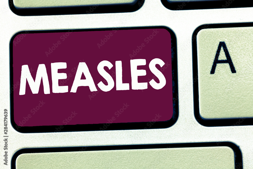 Text sign showing Measles. Conceptual photo Infectious viral disease causing fever and a red ...