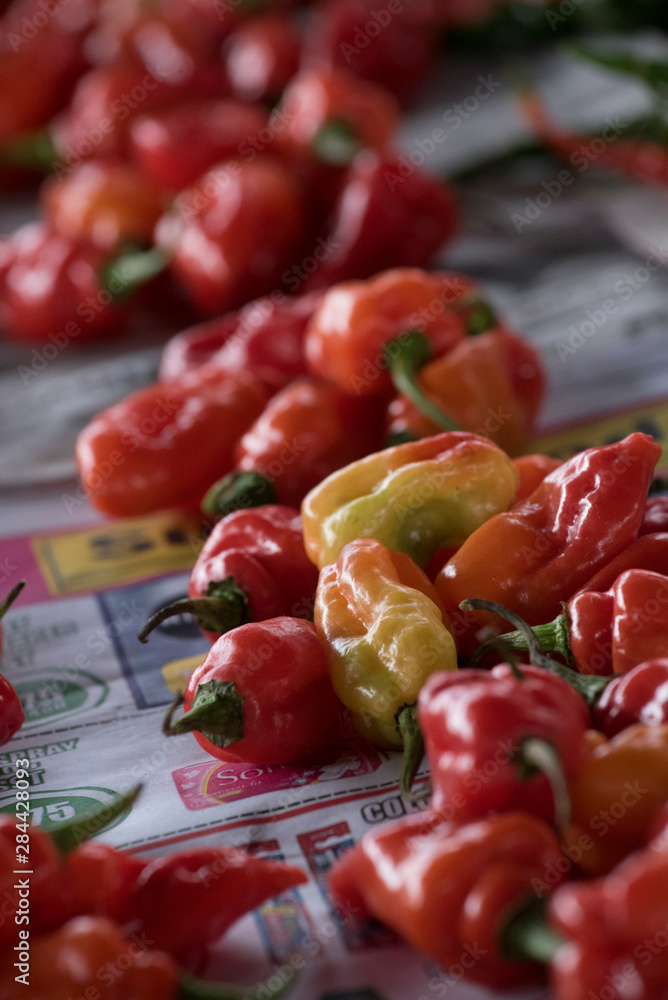 Fiji, Pacific Islands. Peppers and other vegetables on display at open ...