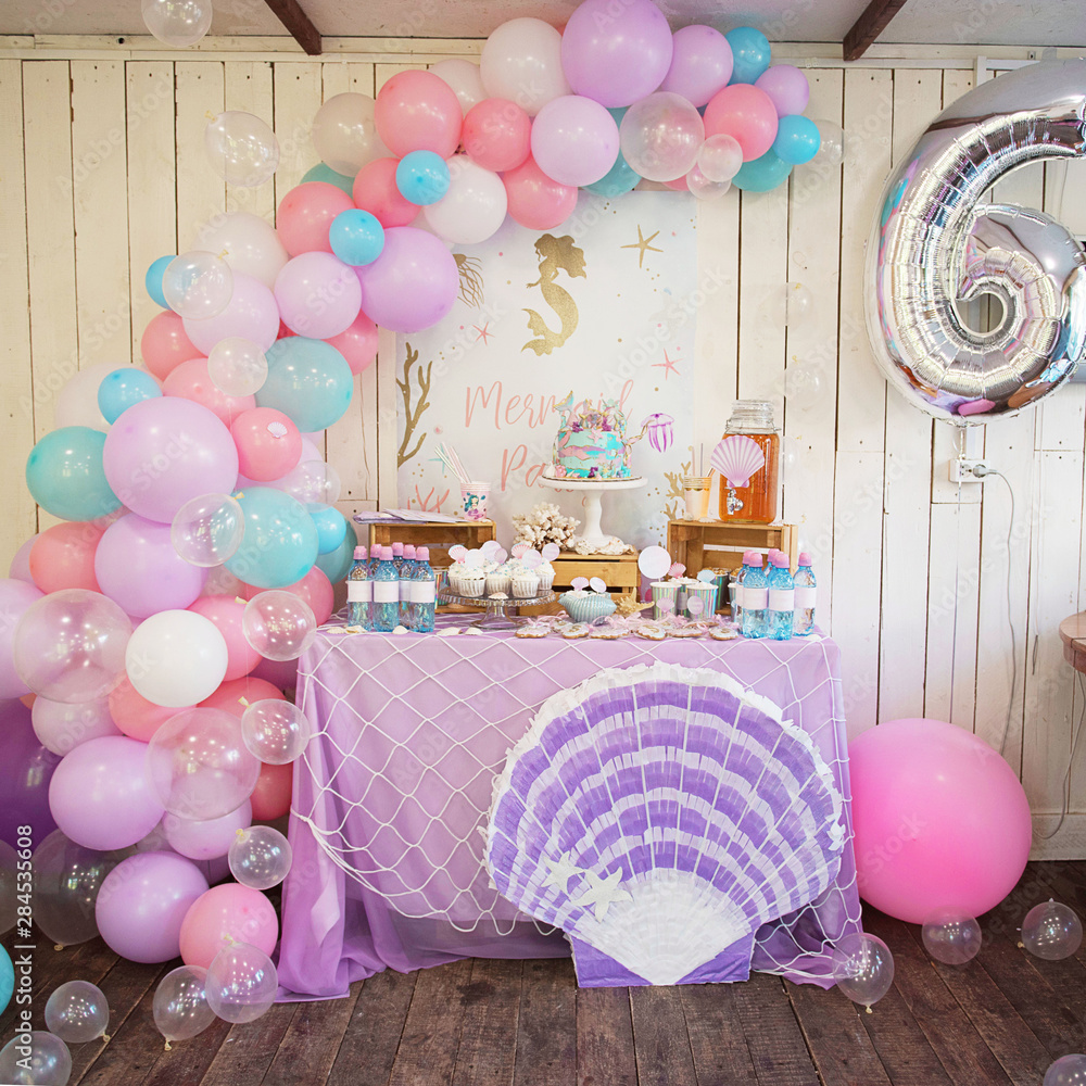 Mermaid Candy Bar. Delicious sweet buffet with cake. A beautiful ...