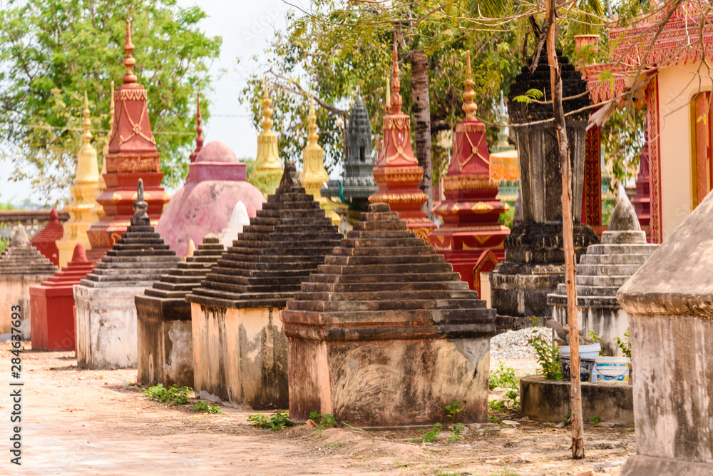 Photo Stock Stupa, traditional Buddhist burial gravestones at a temple ...
