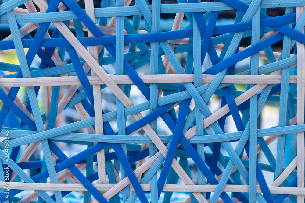 Background of variety colors of rattan lines that are alternately woven ...