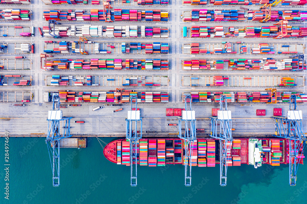 Top view of Deep water port with cargo ship and containers. It is an ...