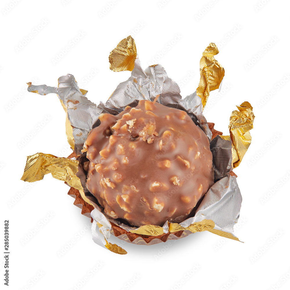 Beautiful chocolate candy ball shape in an open gold wrapper isolated ...